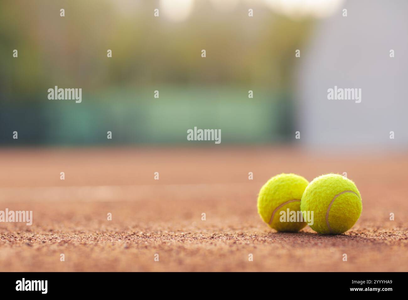 Tennis balls on court floor, closeup Stock Photo - Alamy