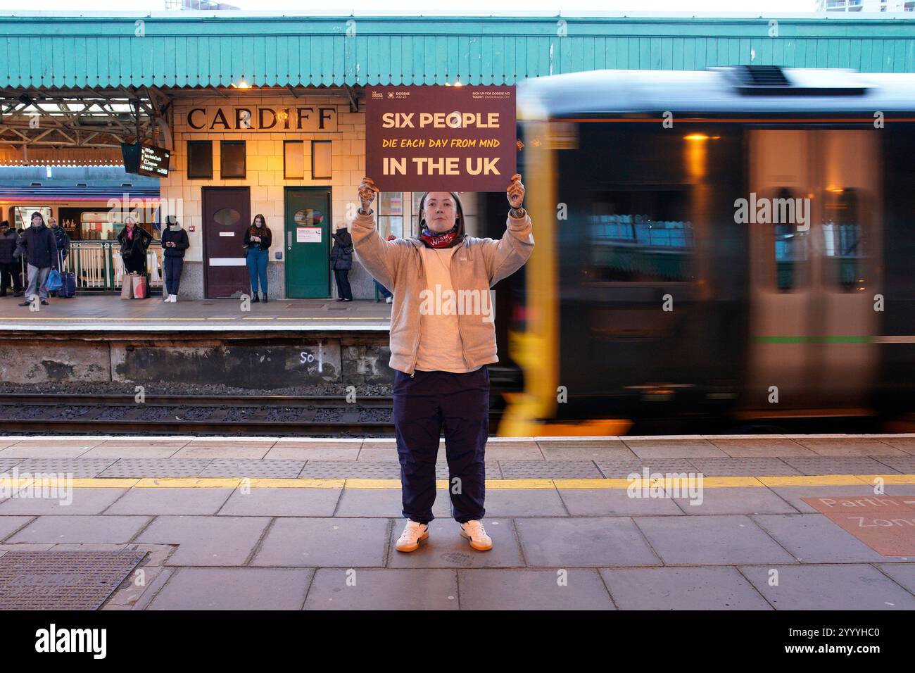 EDITORIAL USE ONLY Campaigner Beth Glastonbury holds a sign at Cardiff ...