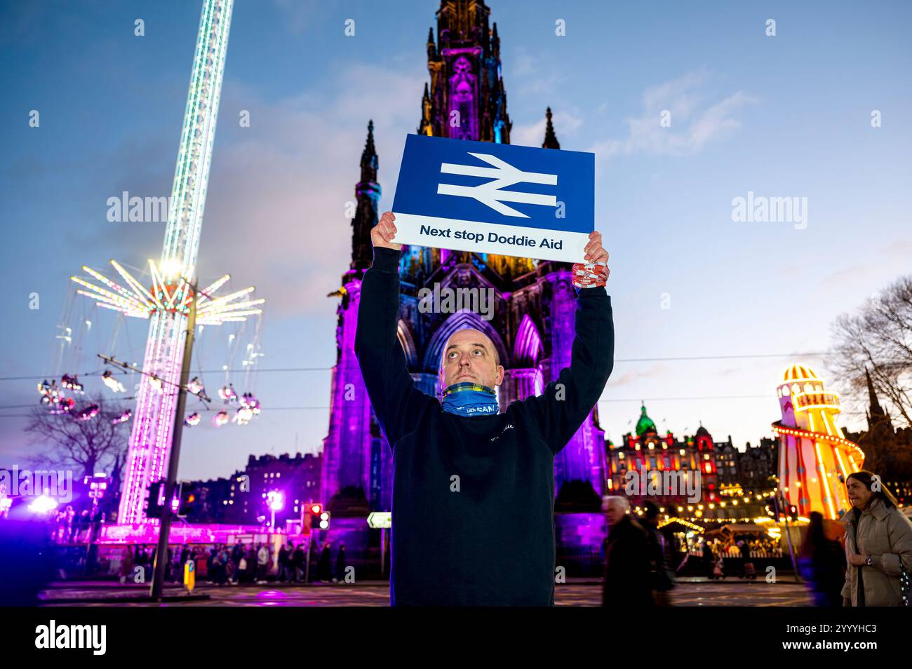 EDITORIAL USE ONLY Campaigner Bruce Aitchison holds a sign at Edinburgh ...