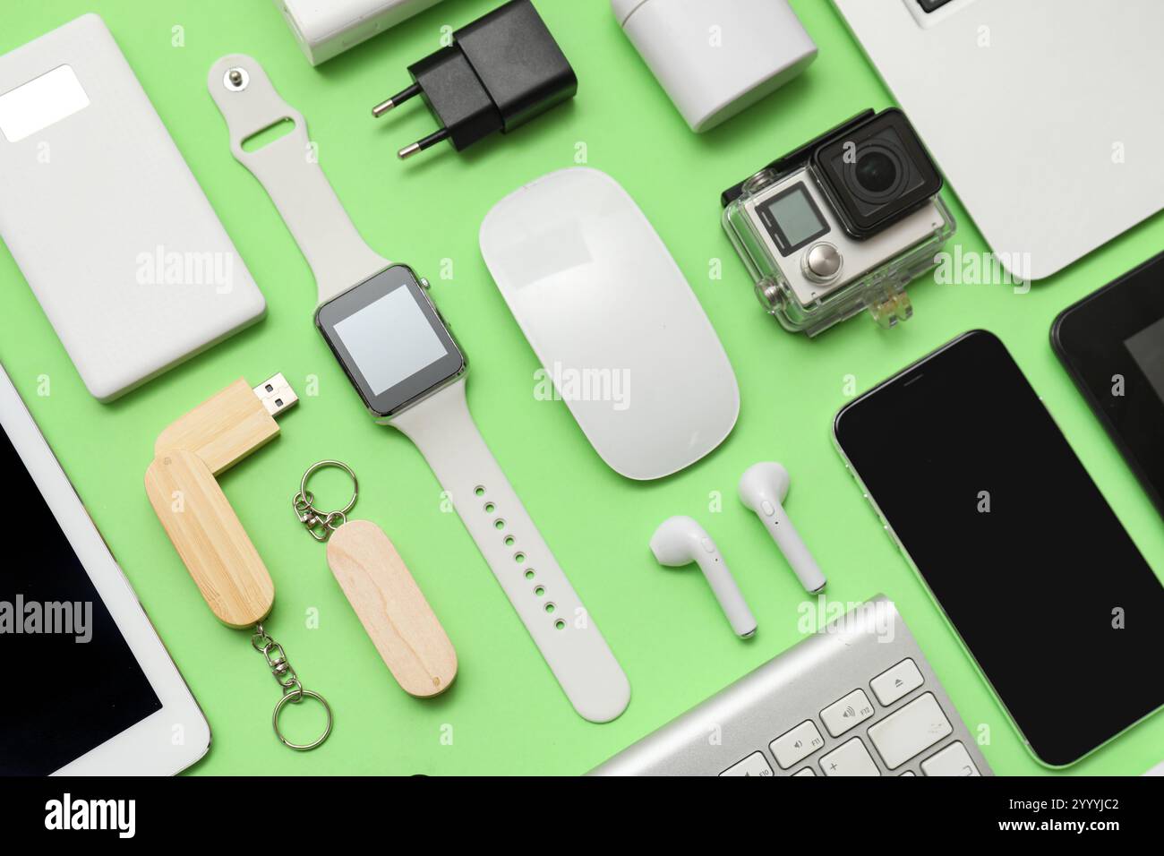 Set of modern devices on green background, top view Stock Photo - Alamy