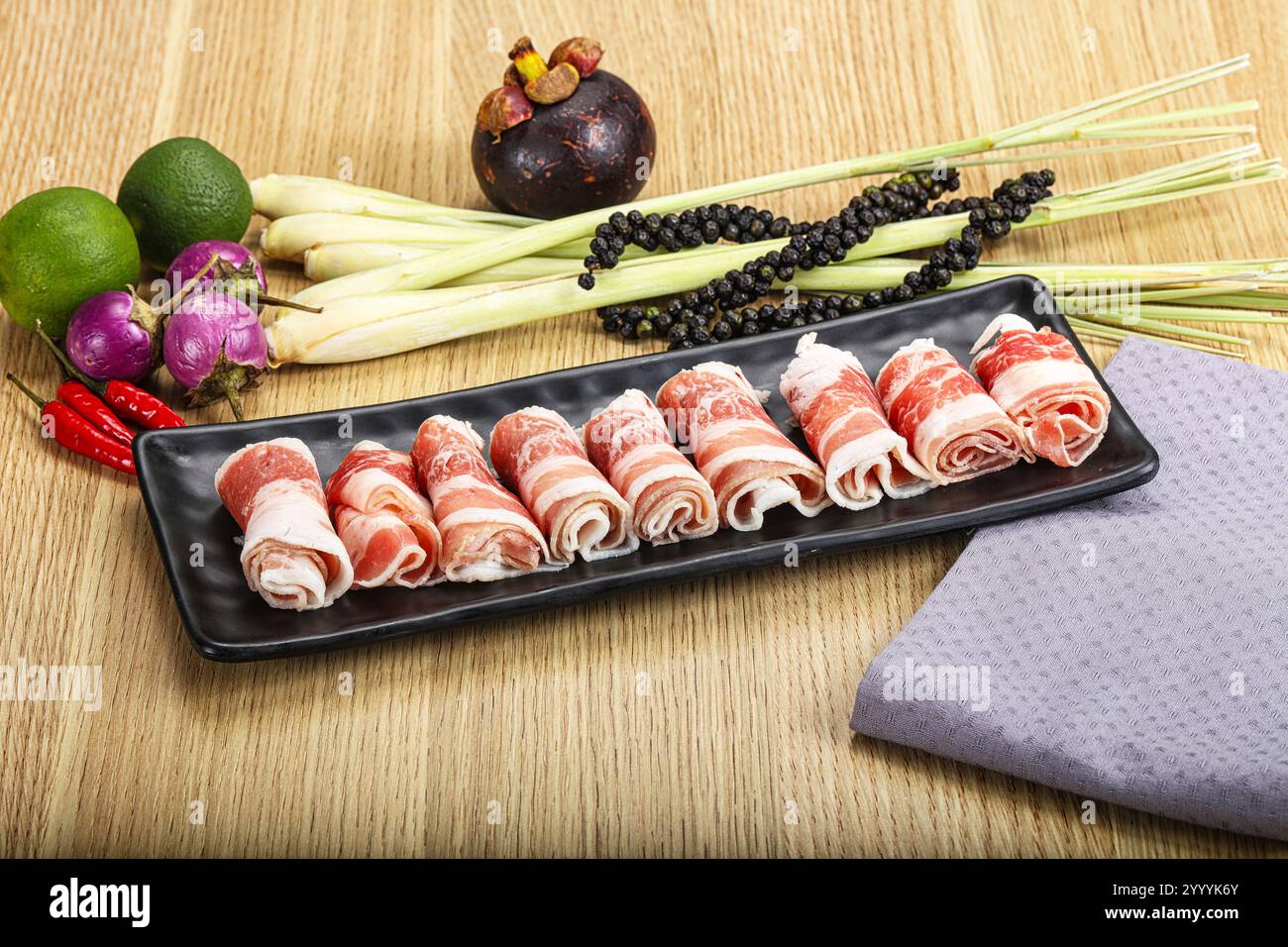Raw beef bacon roll for grill Stock Photo - Alamy