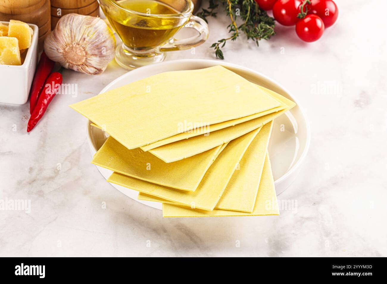 Italian cuisine - dry lasagna sheets for cooking Stock Photo - Alamy