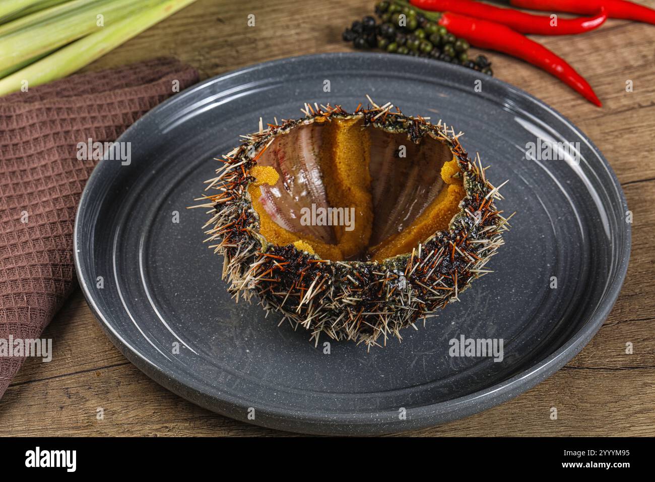 Delicous luxury raw sea urchin delicatessen Stock Photo - Alamy