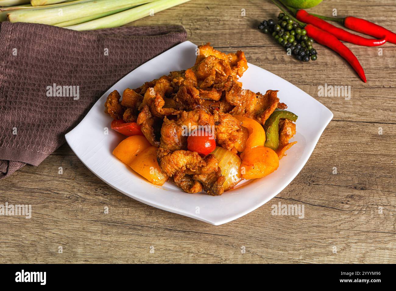 Asian cuisine - roasted crocodile meat with vegetables Stock Photo - Alamy