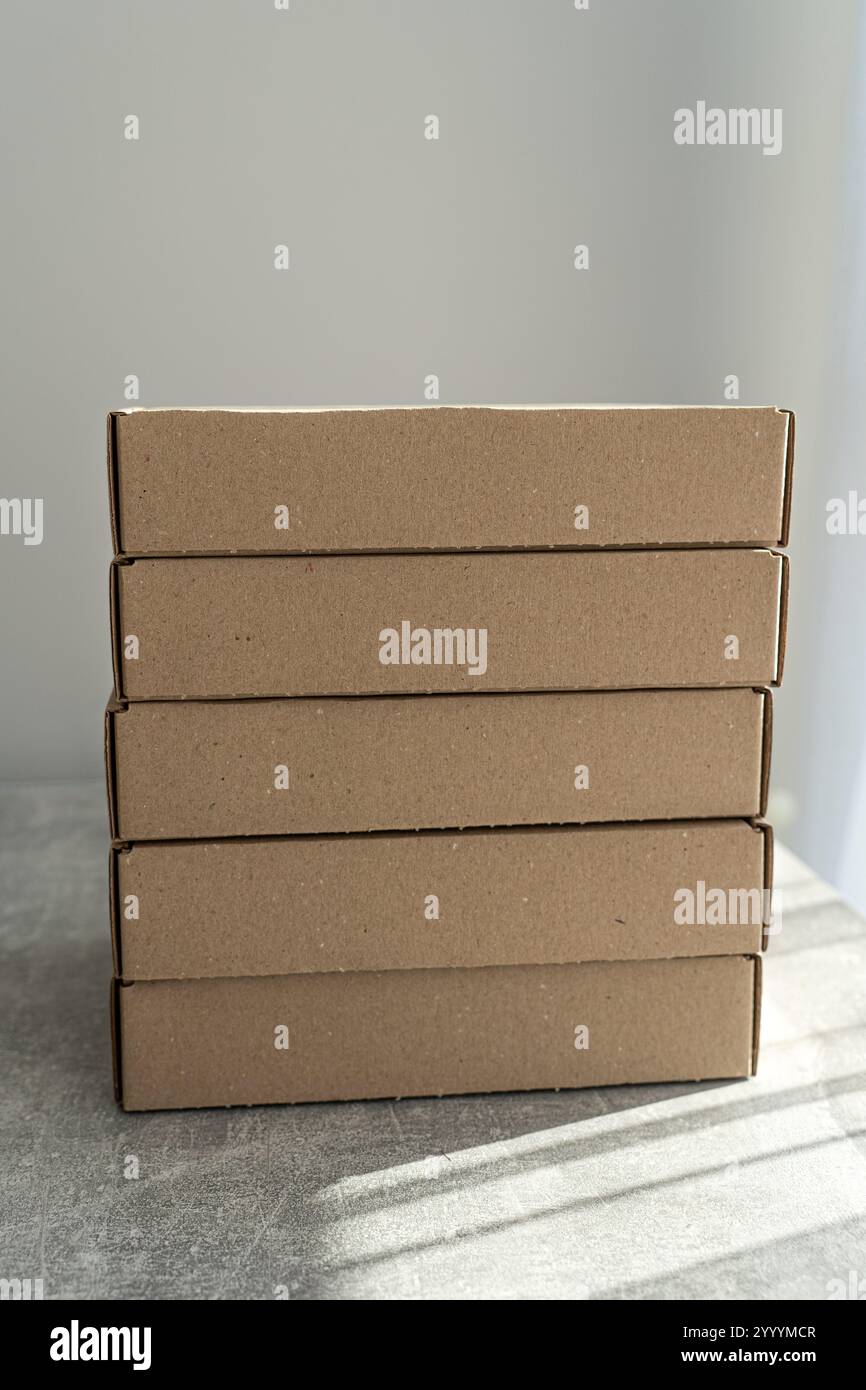 Stack of flat-packed self Stock Photo - Alamy
