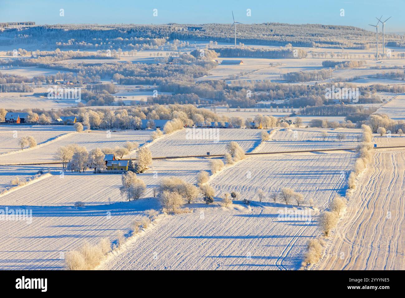 Aerial view at a snowy rural winter landscape in a valley Stock Photo ...