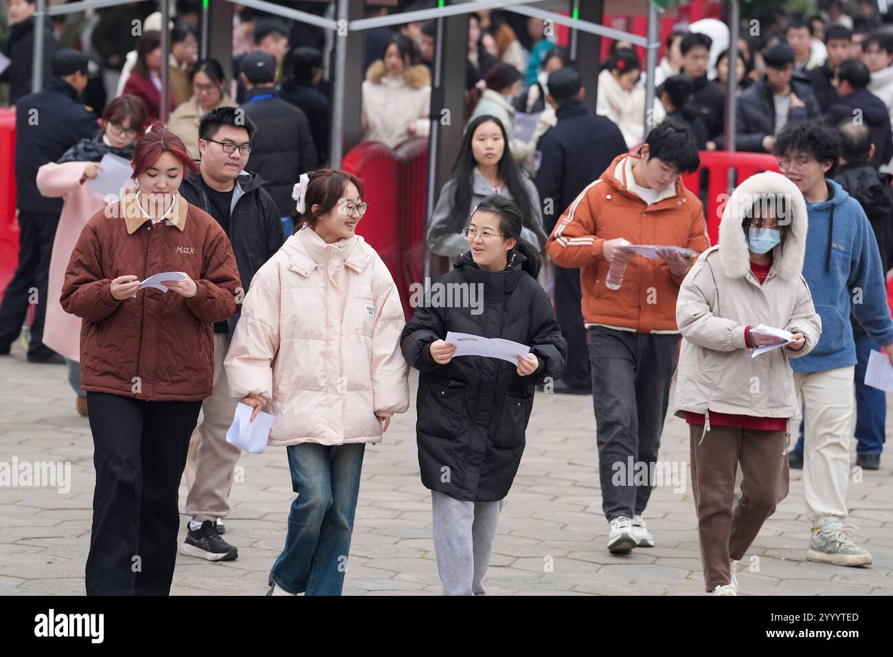 Changsha,China.21th December 2024. Candidates enter an exam venue of ...