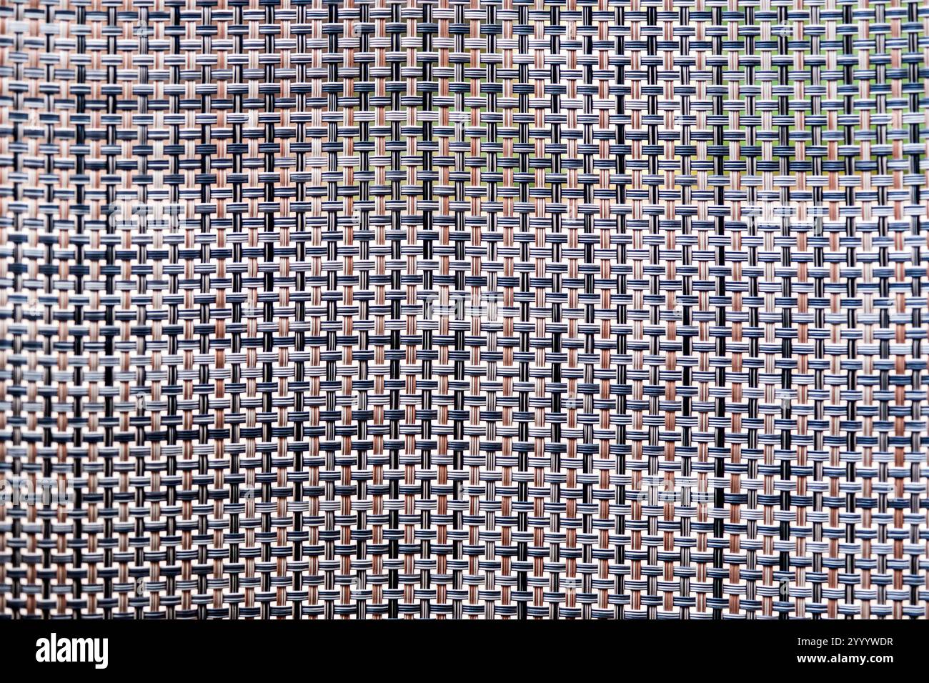 A synthetic ratan patterns of a chair. Brown, black and grey Stock ...