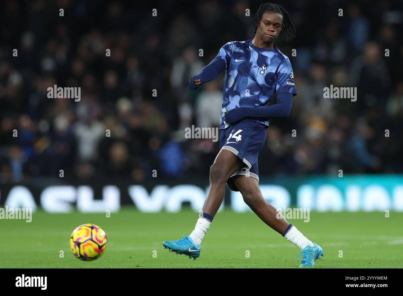 London, UK. 22nd Dec, 2024. Callum Olusesi of Tottenham Hotspur warms ...