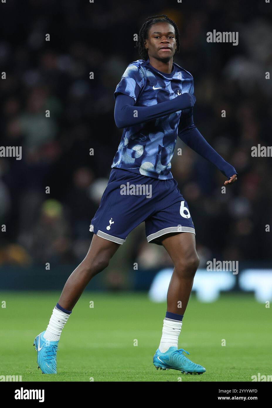 London, UK. 22nd Dec, 2024. Callum Olusesi of Tottenham Hotspur warms ...