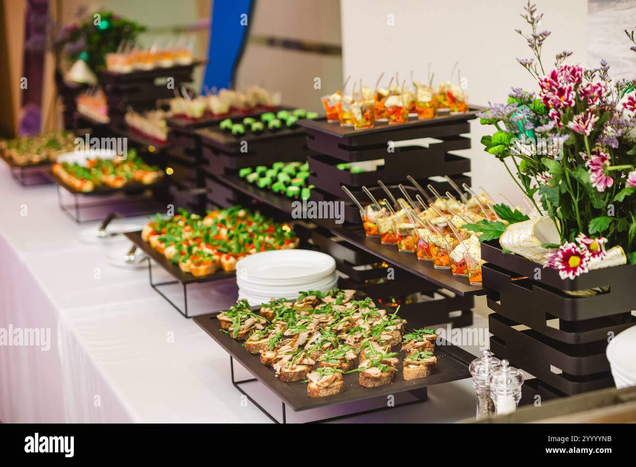 A contemporary hotel dining area featuring a sleek buffet setup Stock ...