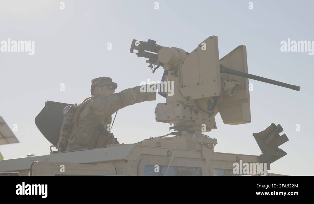 An army gunman mans a Humvee mounted machine gun Stock Video Footage ...