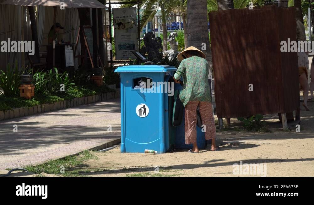 Homeless rummaging Stock Videos & Footage - HD and 4K Video Clips - Alamy