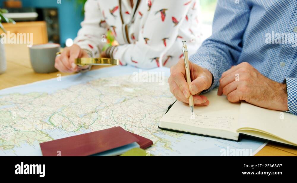 Couple Are Using Map To Plan Their Holiday Itinerary Stock Video ...