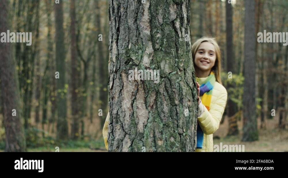 Boy standing behind tree Stock Videos & Footage - HD and 4K Video Clips ...