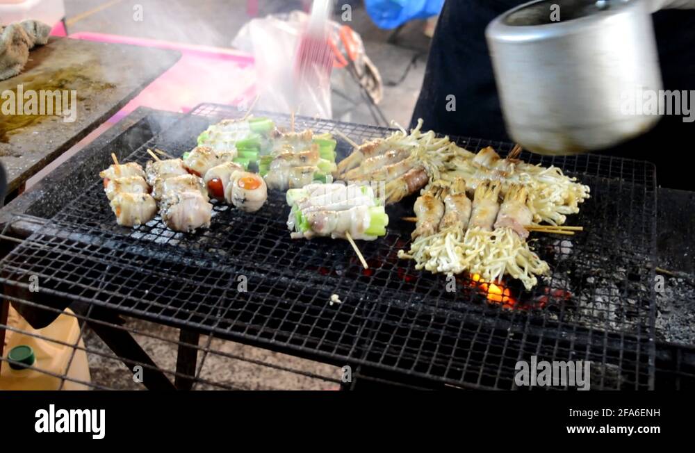 Malaysian barbecue Stock Videos & Footage - HD and 4K Video Clips - Alamy
