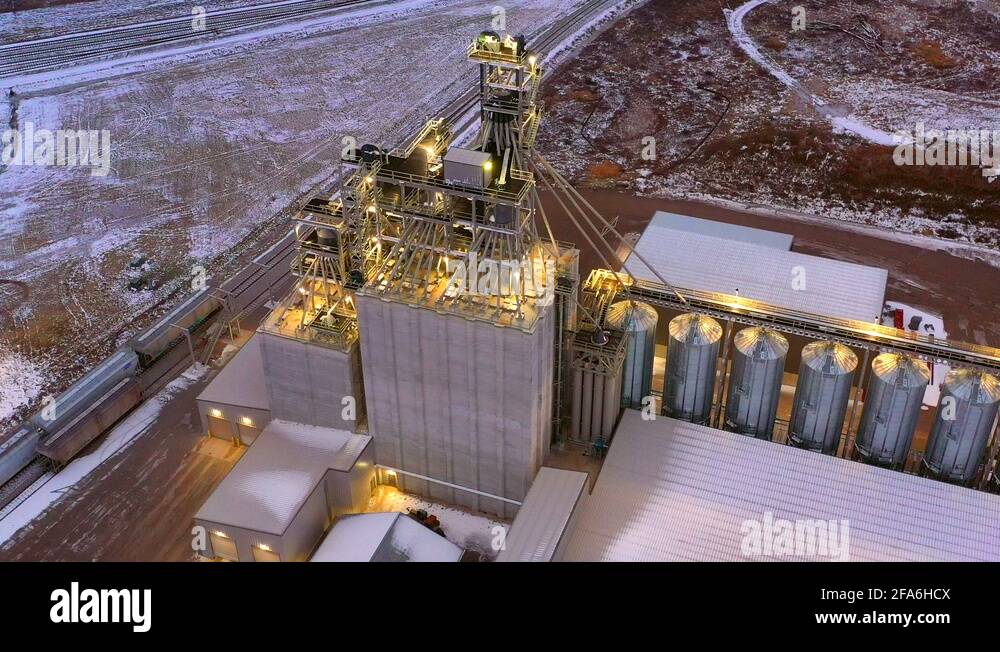 Dynamic moving aerial view of agricultural grain storage silos Stock ...