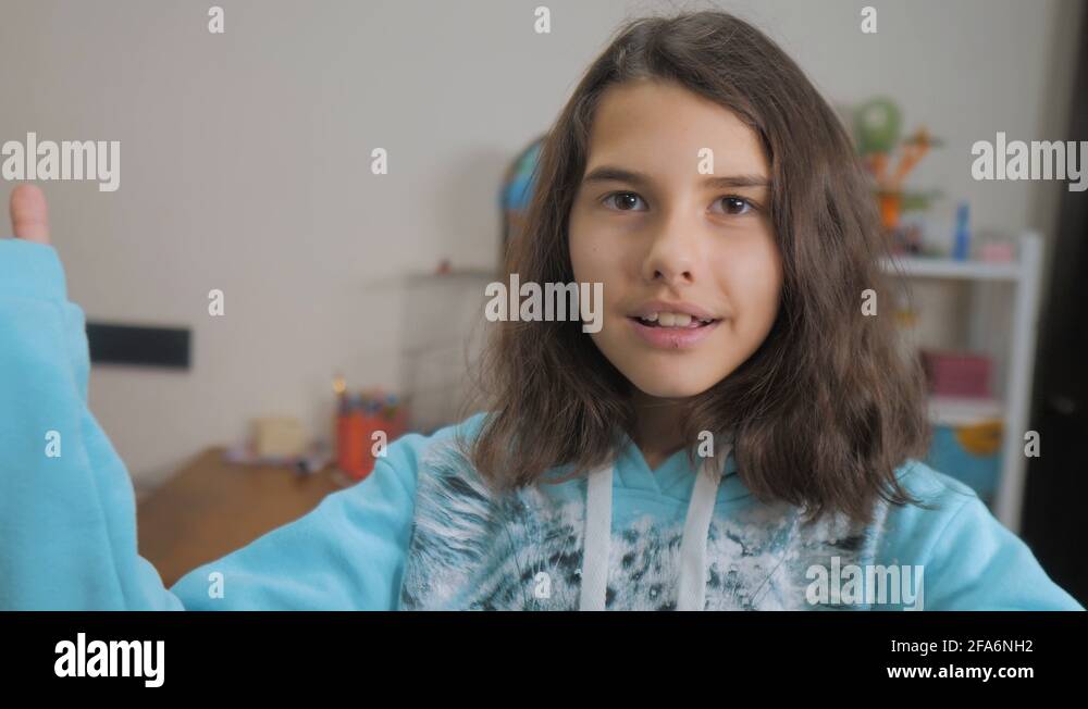 peek a boo. little girl covered her eyes face with her hands hide-and ...