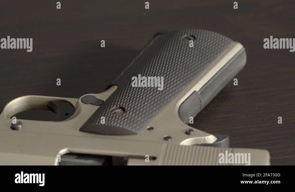 Open and empty pistol, tilting from grip to chamber Stock Video Footage ...