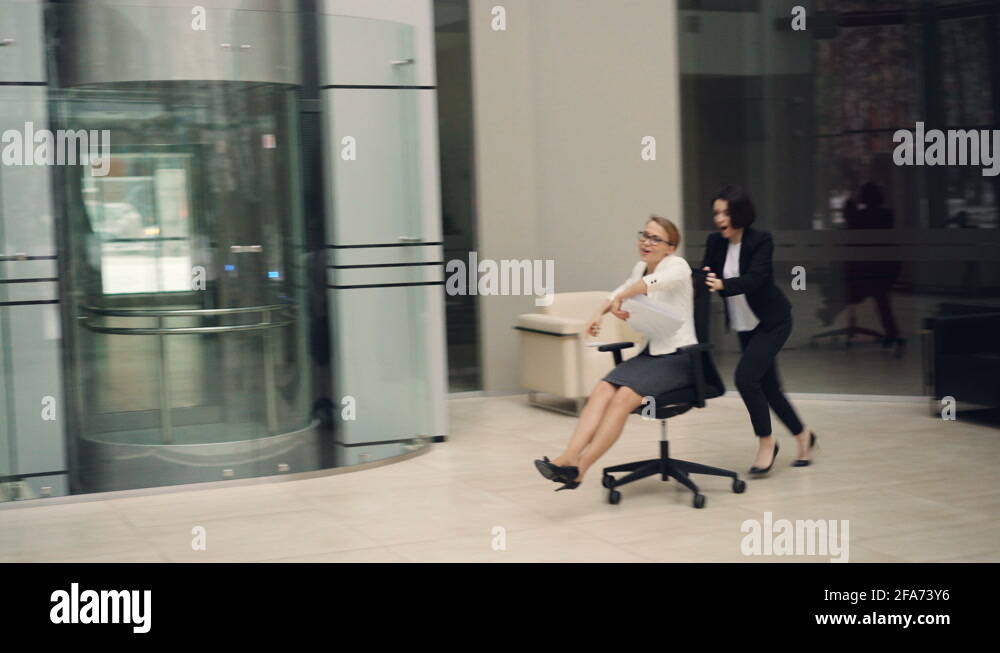 Girl pushing chair Stock Videos & Footage - HD and 4K Video Clips - Alamy