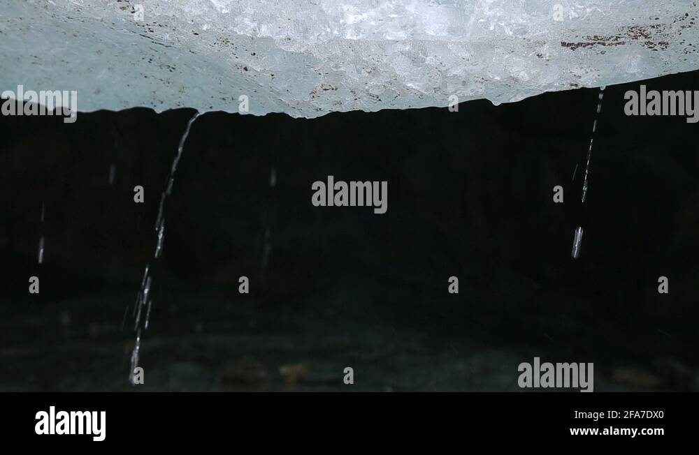 Climate change blue glacier ice melting and dripping water Stock Video ...