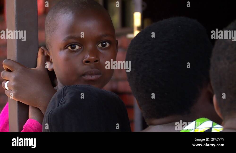 Portrait of a Cute African boy looking at camera, Kigali, Rwanda ...