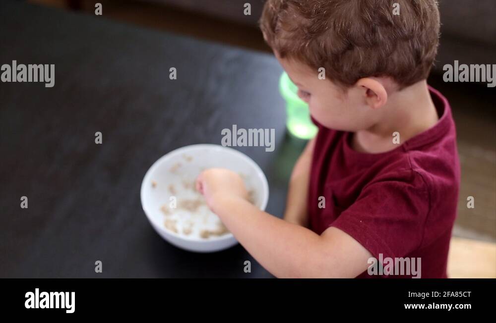Boy eating breakfast Stock Videos & Footage - HD and 4K Video Clips - Alamy