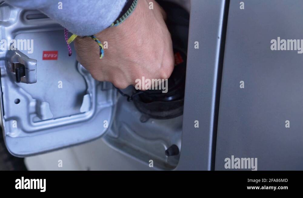 Man filling tank Stock Videos & Footage - HD and 4K Video Clips - Alamy