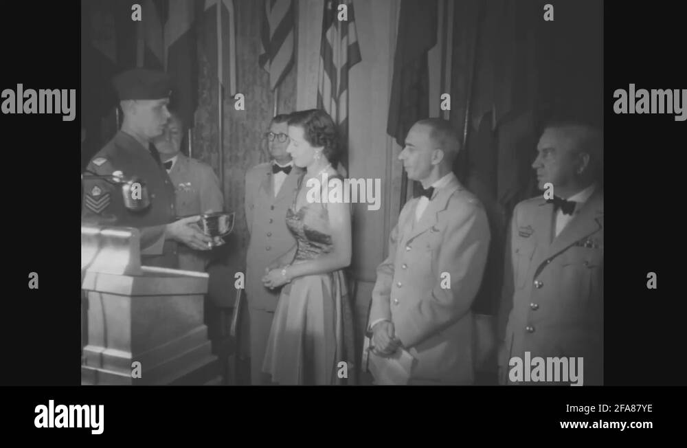 Mrs. Deery receives award, steps to rostrum, and speaks to cadets ...