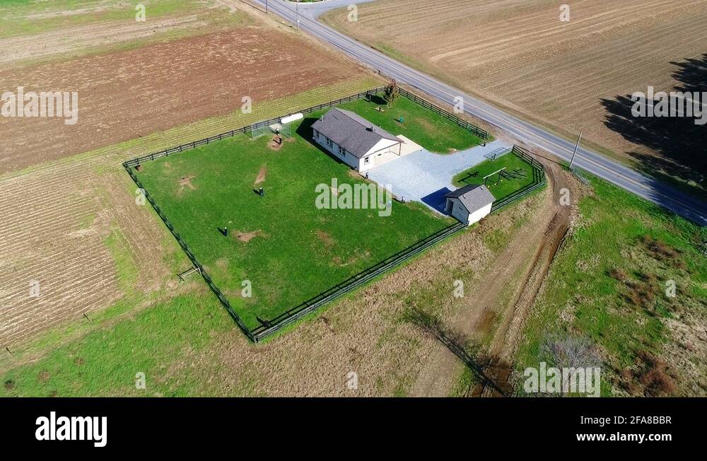Amish One Room School House with Amish Children Playing Baseball as ...