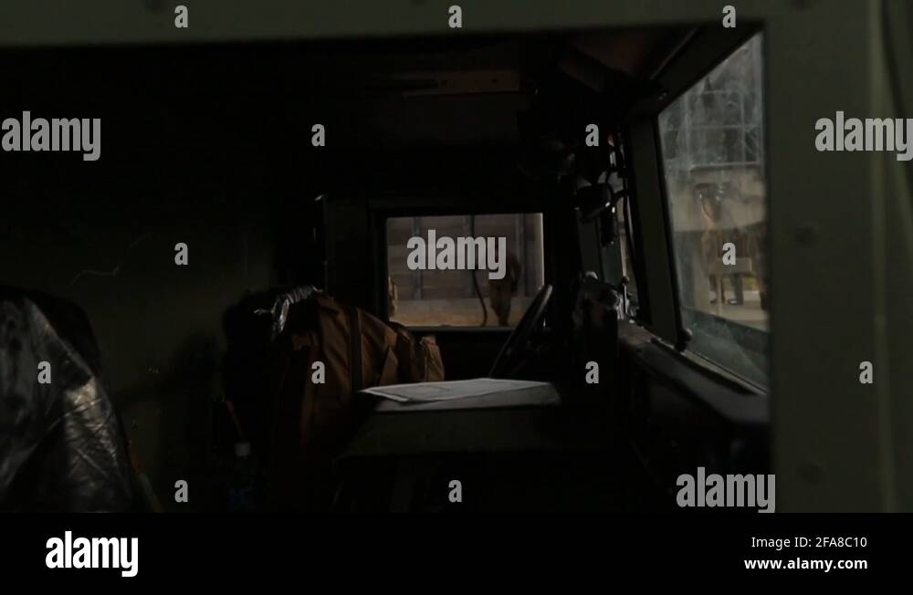 Marines practice their fast-roping skills at the Camp Hansen rappel ...