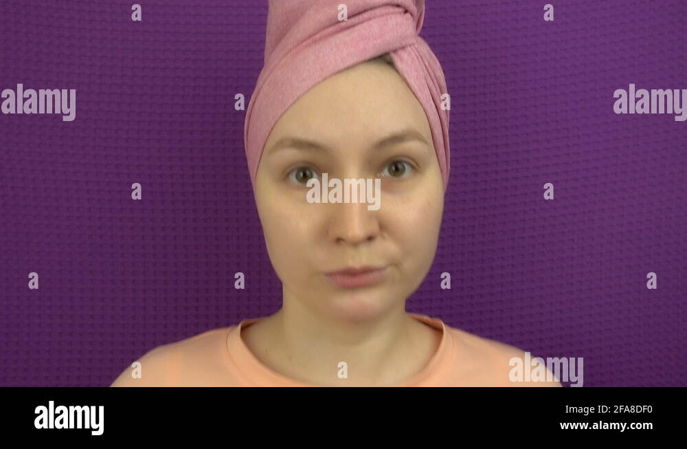 Close up view in front of the mirror of daily care routine process of ...