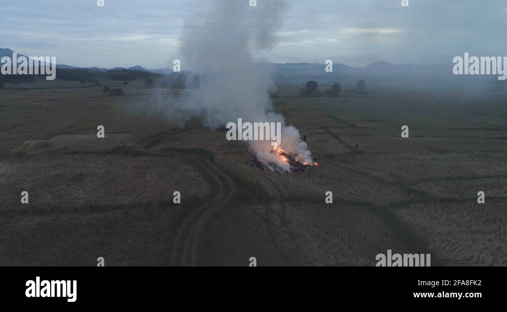 Panning around farm fires burning rice straw making lots of pollution ...