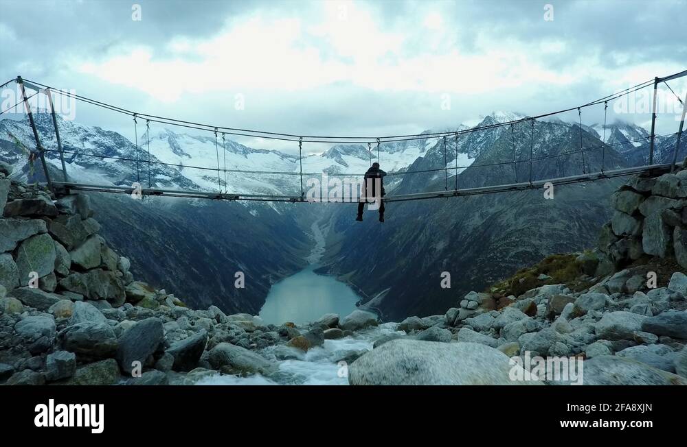 Man sitting on bridge in Stock Videos & Footage - HD and 4K Video Clips ...