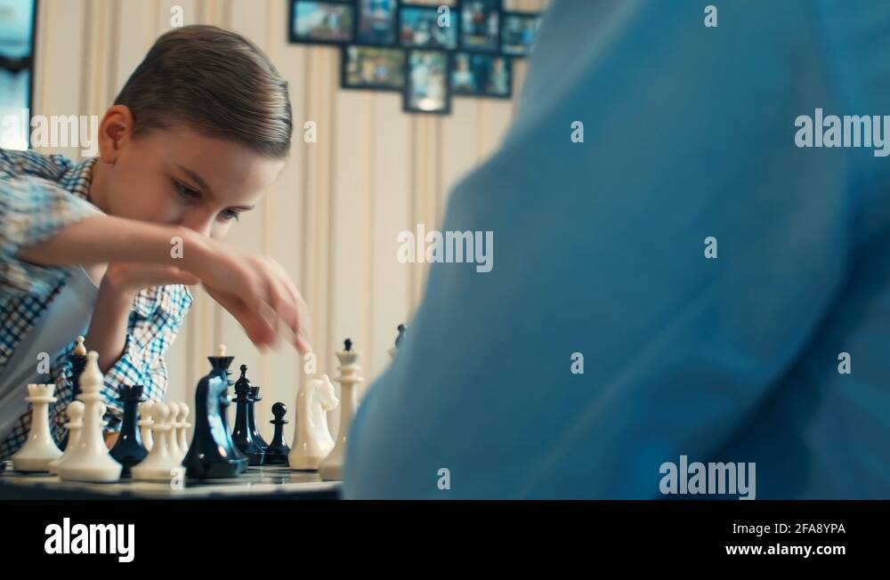 Kid playing chess Stock Videos & Footage - HD and 4K Video Clips - Alamy