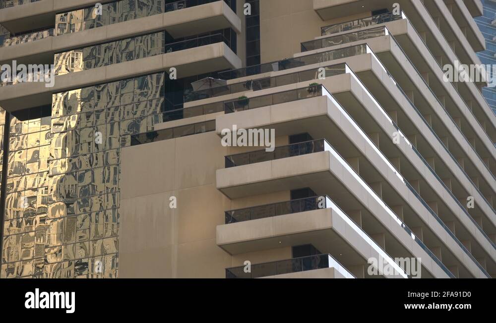 Stepped building with balconies Stock Video Footage - Alamy