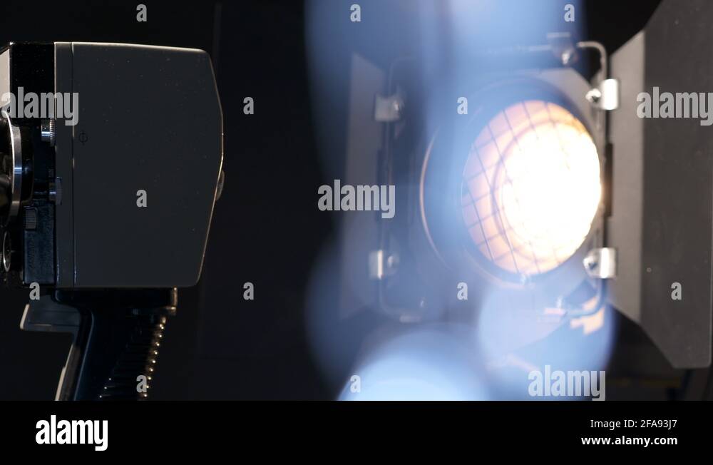 Vintage 8mm film movie camera rotating on black background Stock Video ...