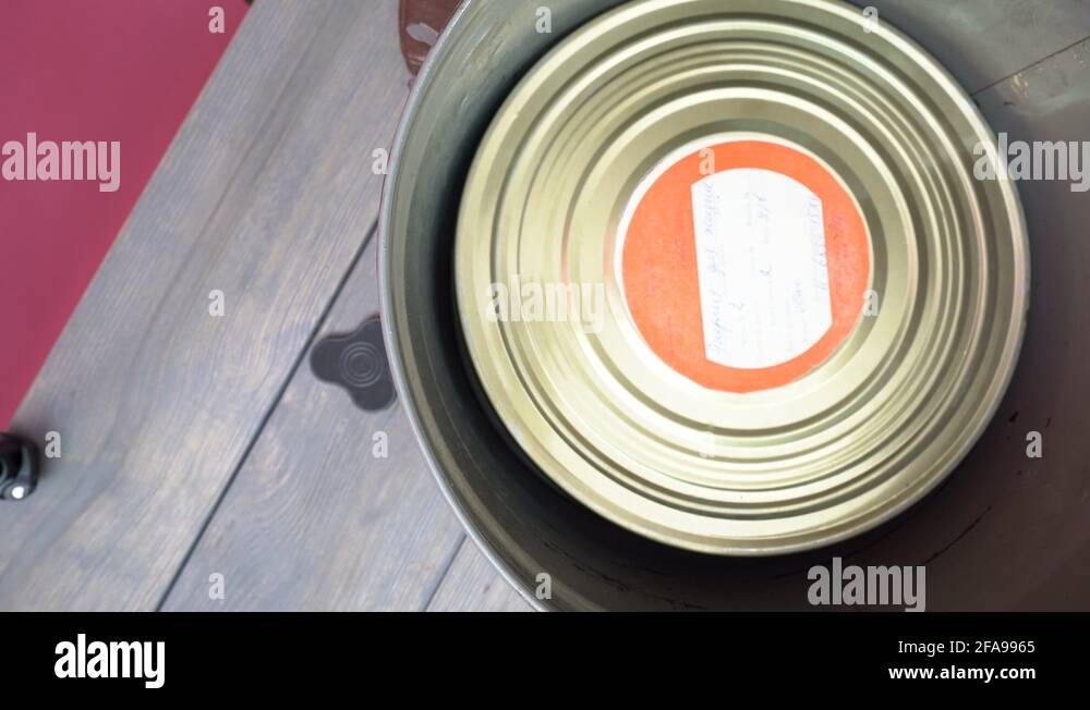 Vintage film reel box in rustic movie storage trunk. Closing container ...