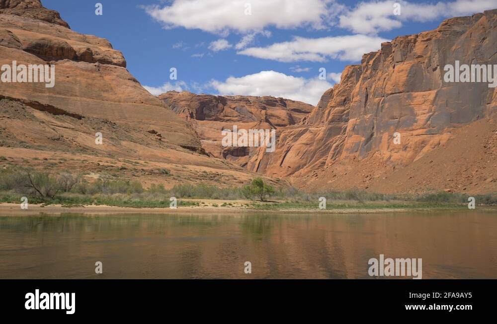 Arid cliffs along a river Stock Video Footage - Alamy