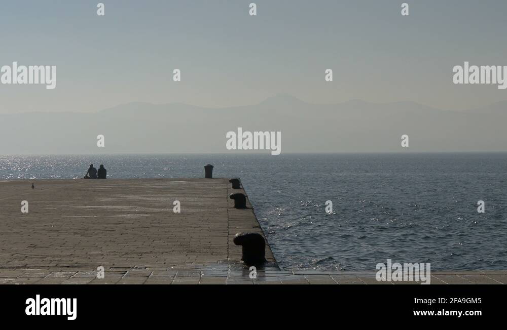 Sitting on a dock Stock Videos & Footage - HD and 4K Video Clips - Alamy