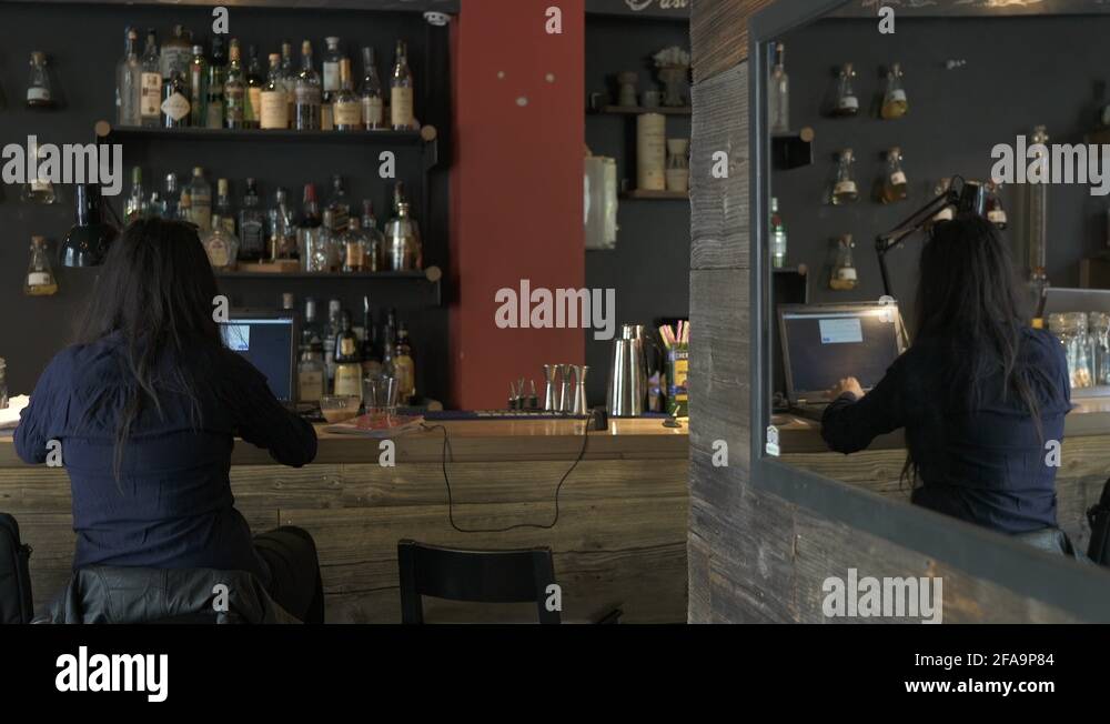 Woman sitting counter Stock Videos & Footage - HD and 4K Video Clips ...