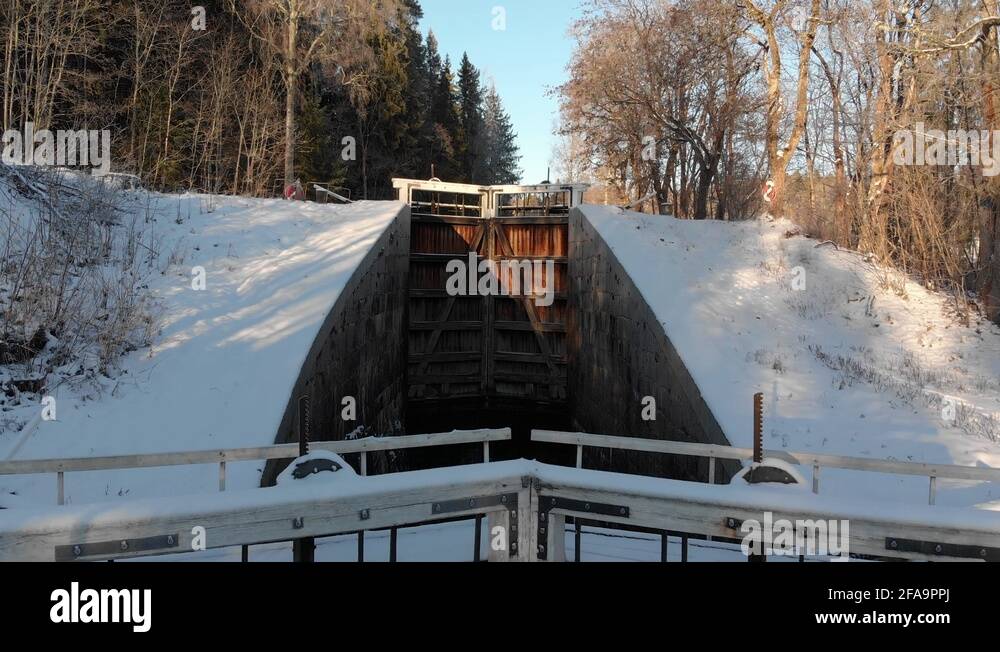 Flying at low altitue towards a closed pound lock while ascending over ...