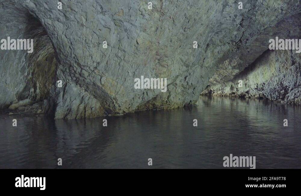 Lake inside a cave Stock Video Footage - Alamy