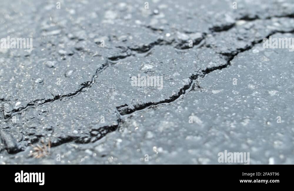 Cracks in pavement Stock Videos & Footage - HD and 4K Video Clips - Alamy