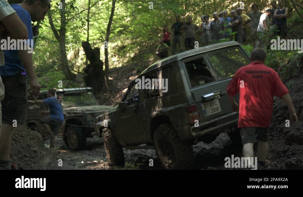 Cars stuck mud Stock Videos & Footage - HD and 4K Video Clips - Alamy