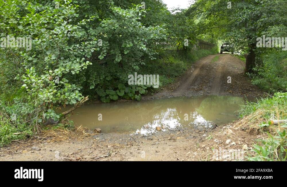 Car puddle Stock Videos & Footage - HD and 4K Video Clips - Alamy