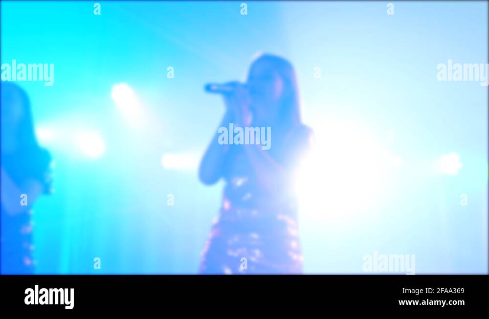 light two singers spotlight concert retro music concert pop band ...