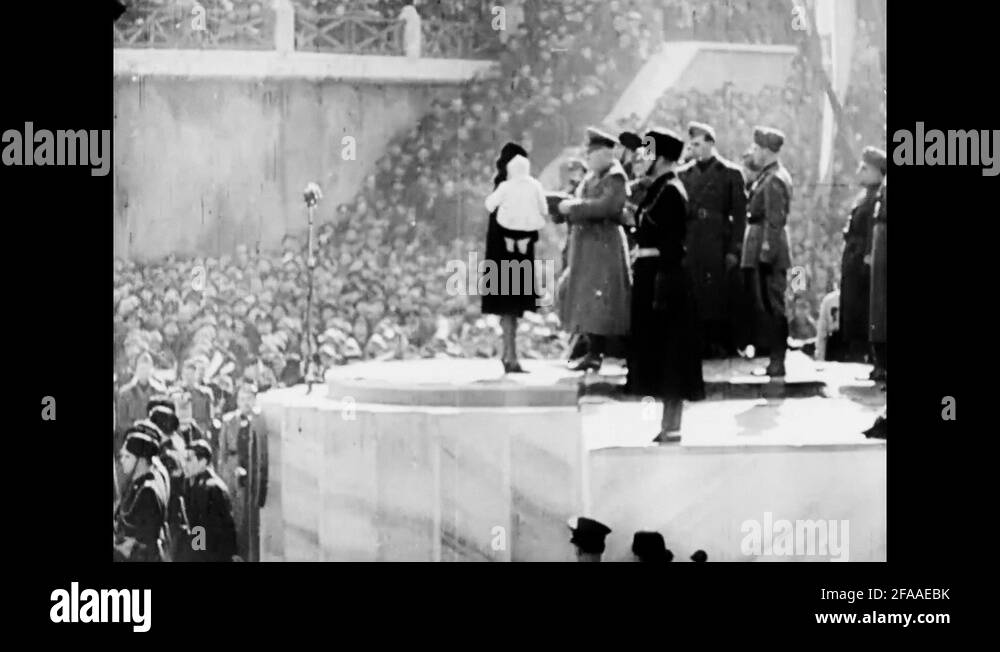 Benito Mussolini Kissing A Baby During Military Festivites Stock Video ...