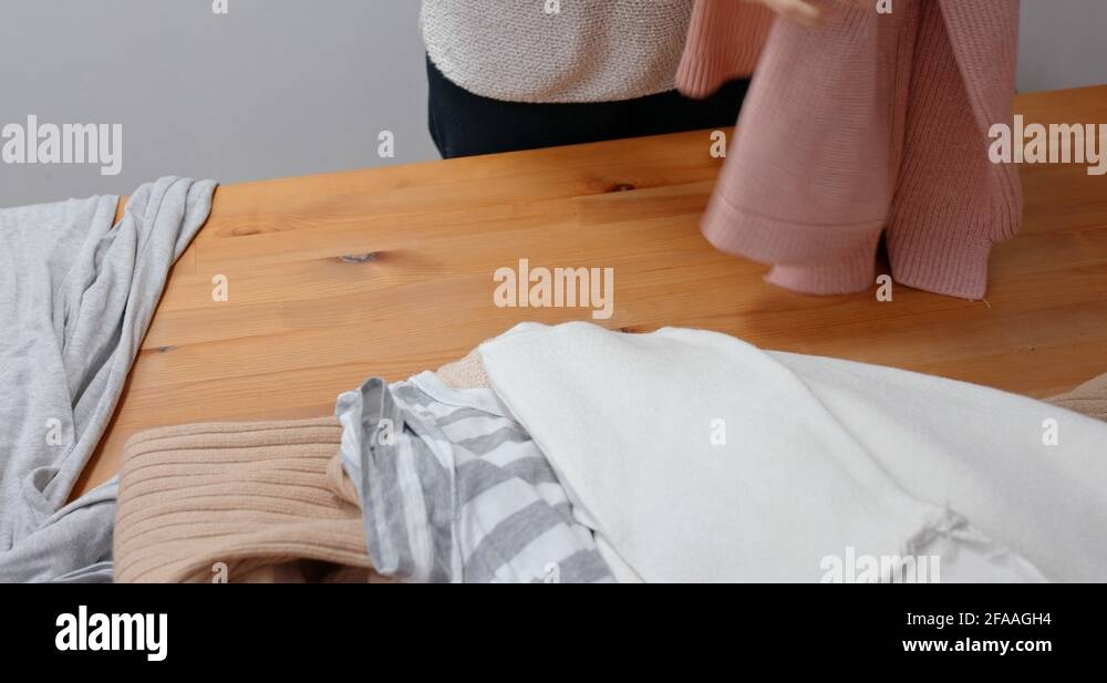 Tidy clothing Stock Videos & Footage - HD and 4K Video Clips - Alamy