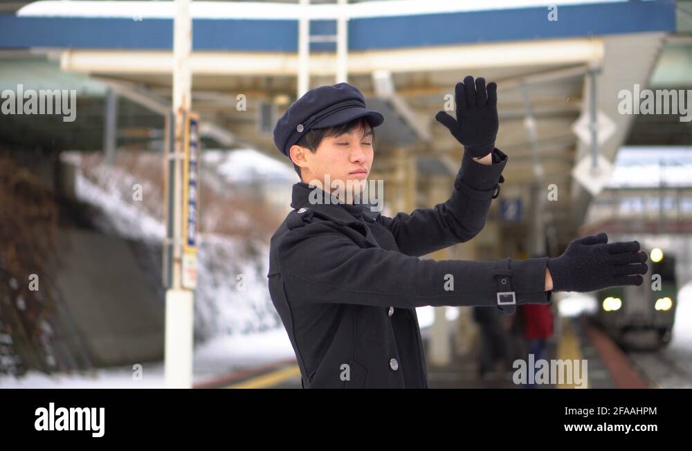 Japanese Train Station Master Staff Pointing For Train Signaling Stock ...
